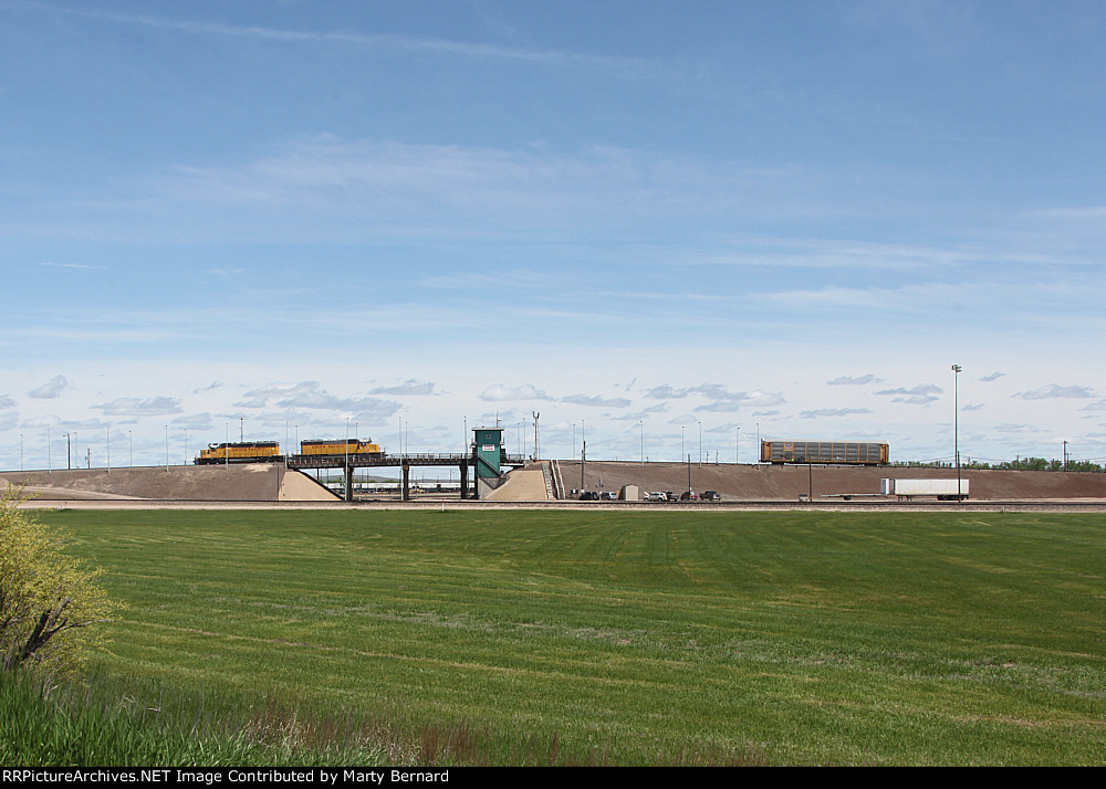 UP 823 and 3113 Just Pushed the Last Car Over The East Hump of Bailey Yard